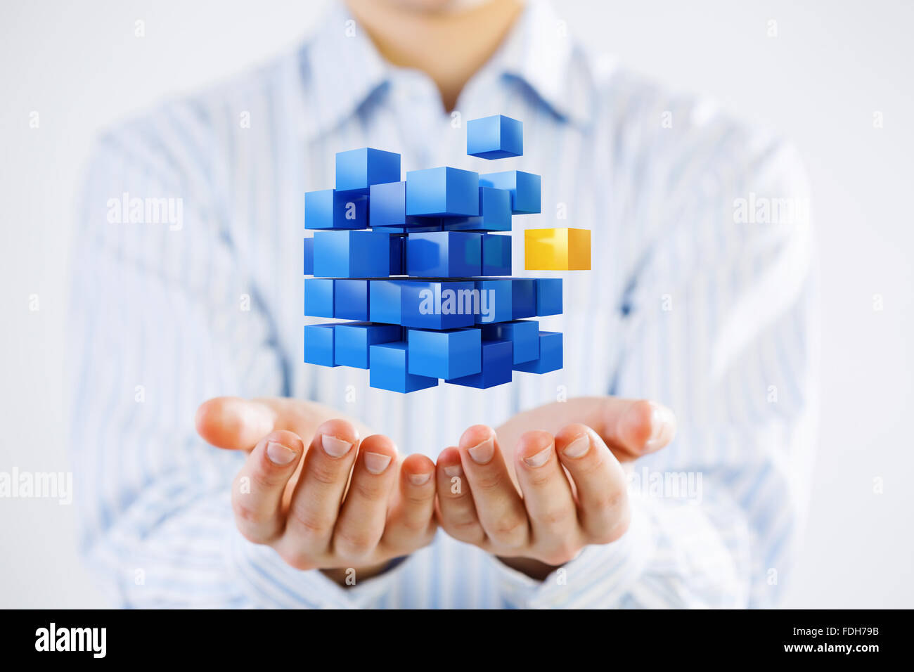 Businessman hand shows cube as symbol of problem solving Stock Photo ...