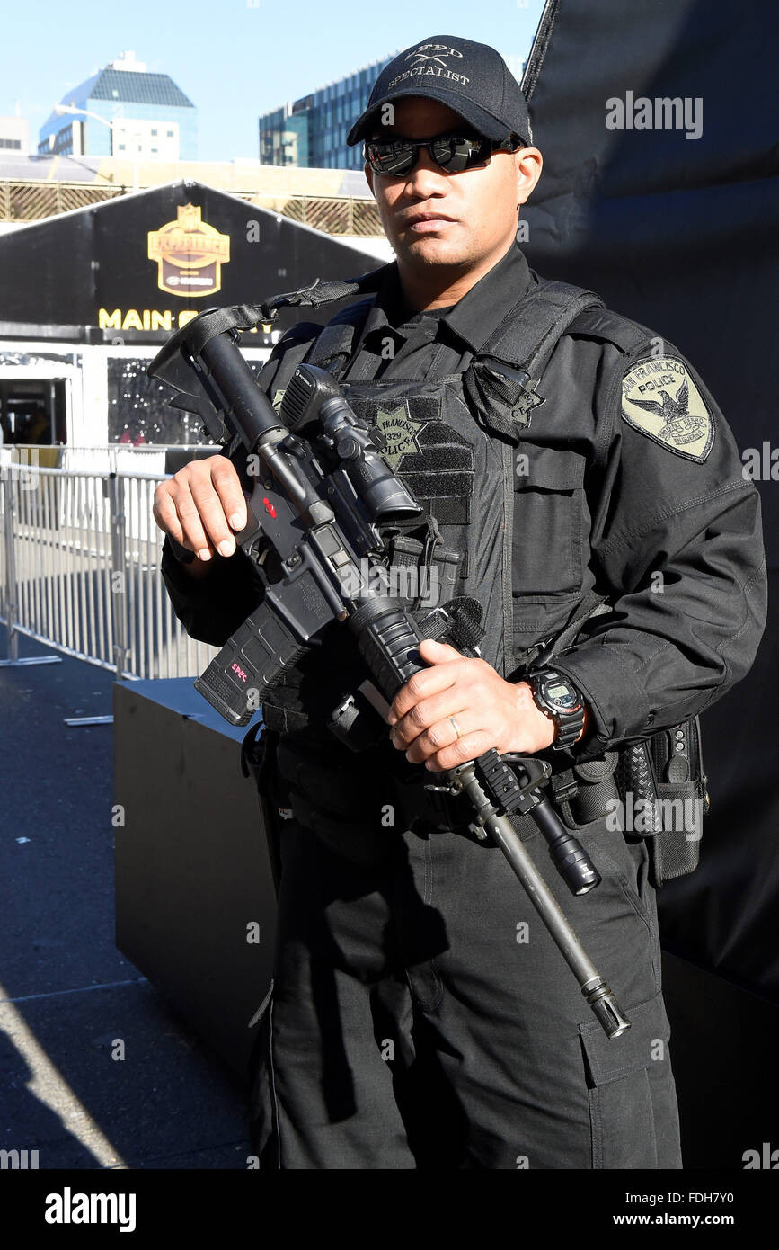 Sunday, January 31, 2016: A San Francisco police officer stands guard ...