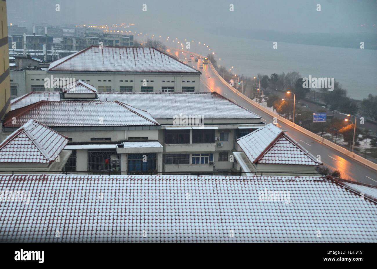Changsha, China's Hunan Province. 1st Feb, 2016. Building roofs are ...