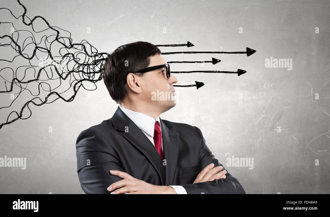 Thoughtful adult businessman with arrows and thoughts coming out of his ...