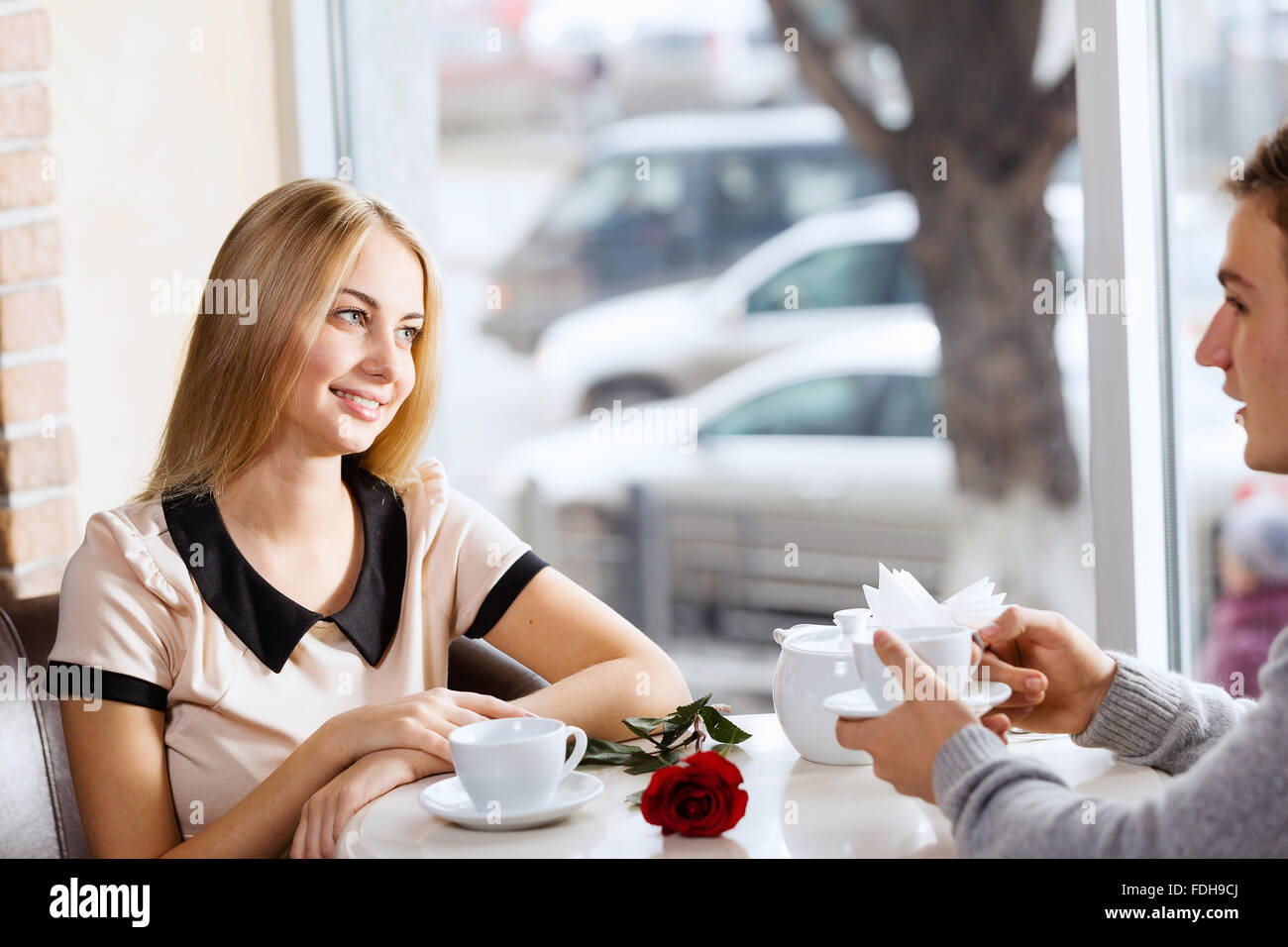 Young attractive lady having date at cafe Stock Photo - Alamy