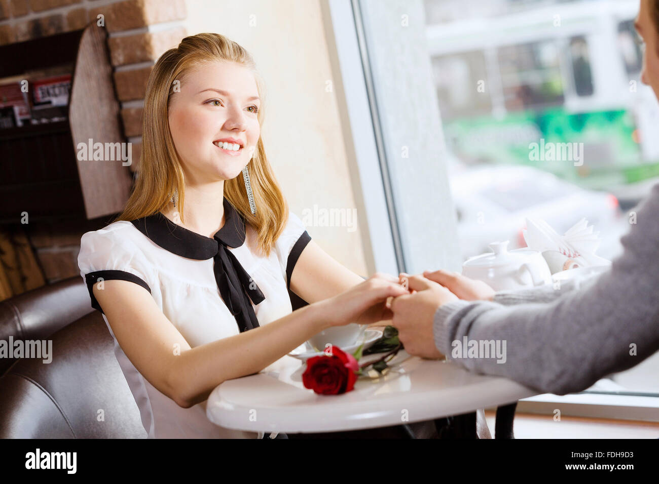 Young attractive lady having date at cafe Stock Photo - Alamy