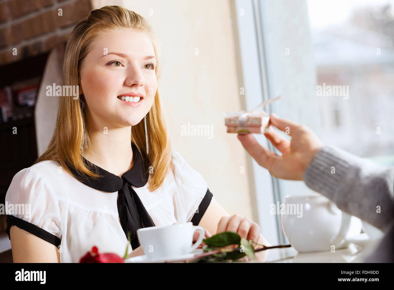Young attractive lady having date at cafe Stock Photo - Alamy