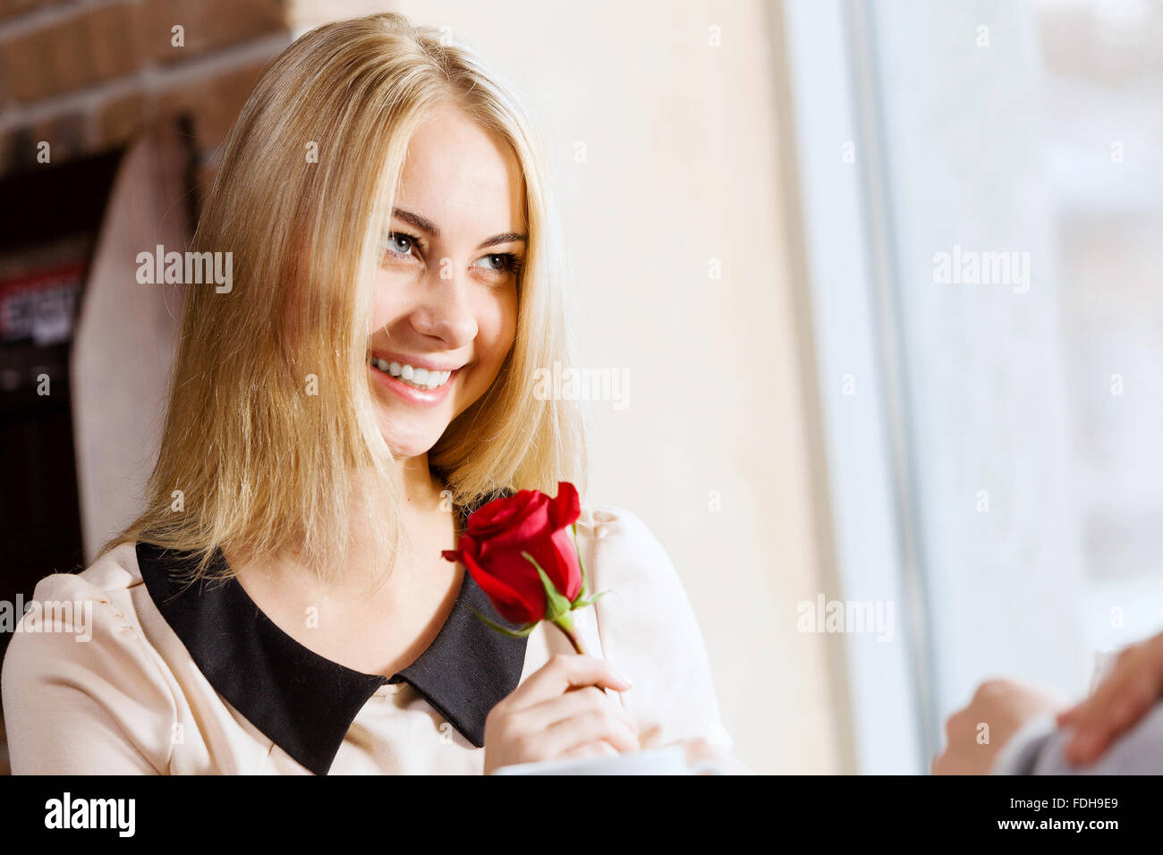 Young attractive lady having date at cafe Stock Photo - Alamy