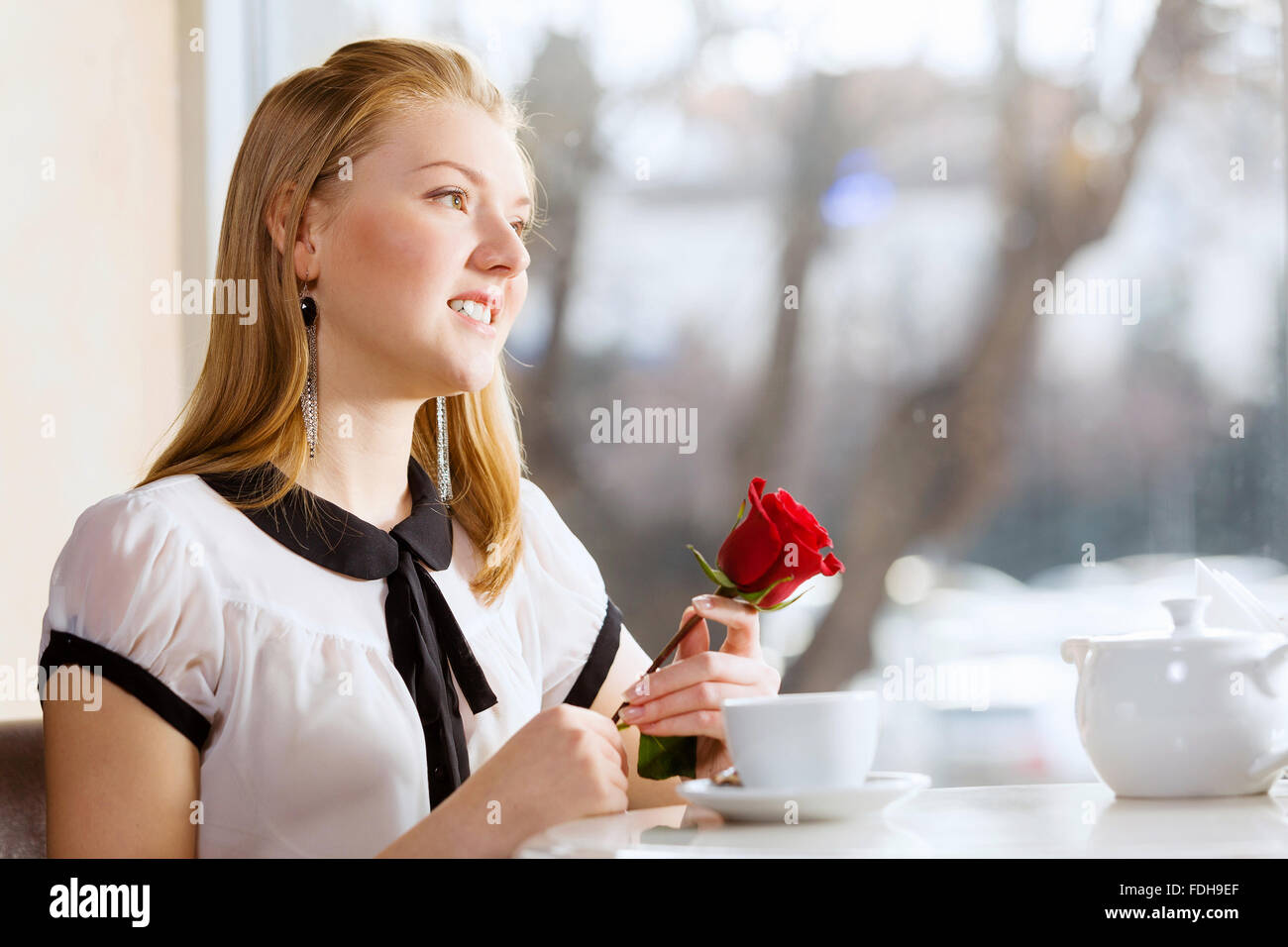 Young attractive lady having date at cafe Stock Photo - Alamy