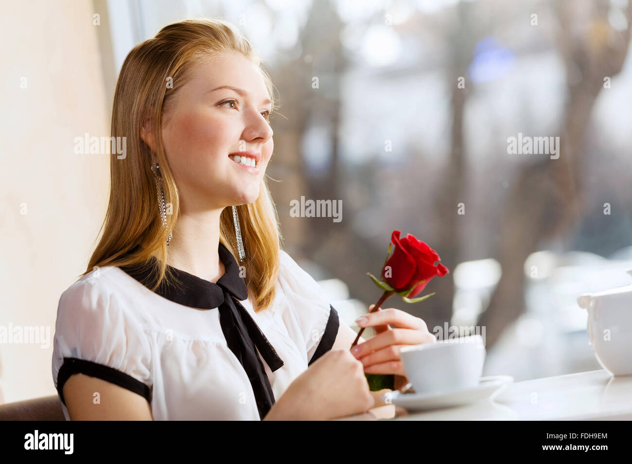 Young attractive lady having date at cafe Stock Photo - Alamy