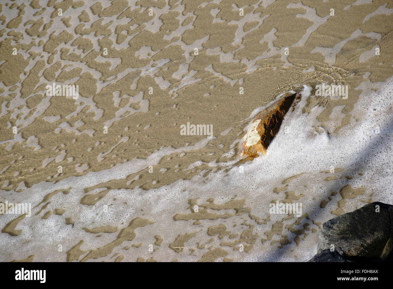 Water flows by rocks hi-res stock photography and images - Alamy