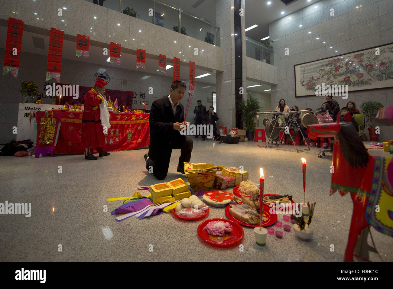 Changsha, Changsha, CHN. 1st Feb, 2016. A wizard presents the ...
