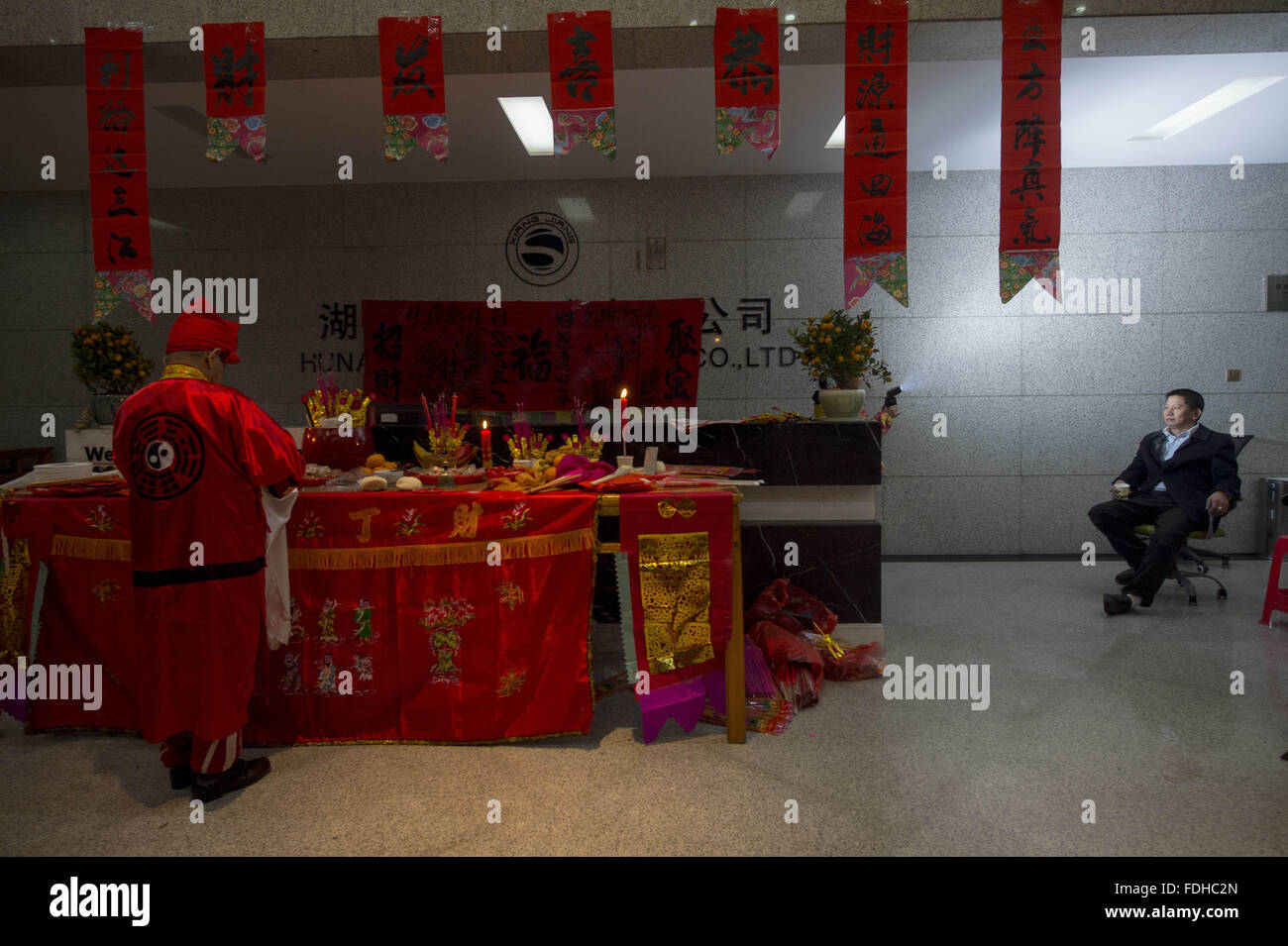 Changsha, Changsha, CHN. 1st Feb, 2016. A wizard presents the ...