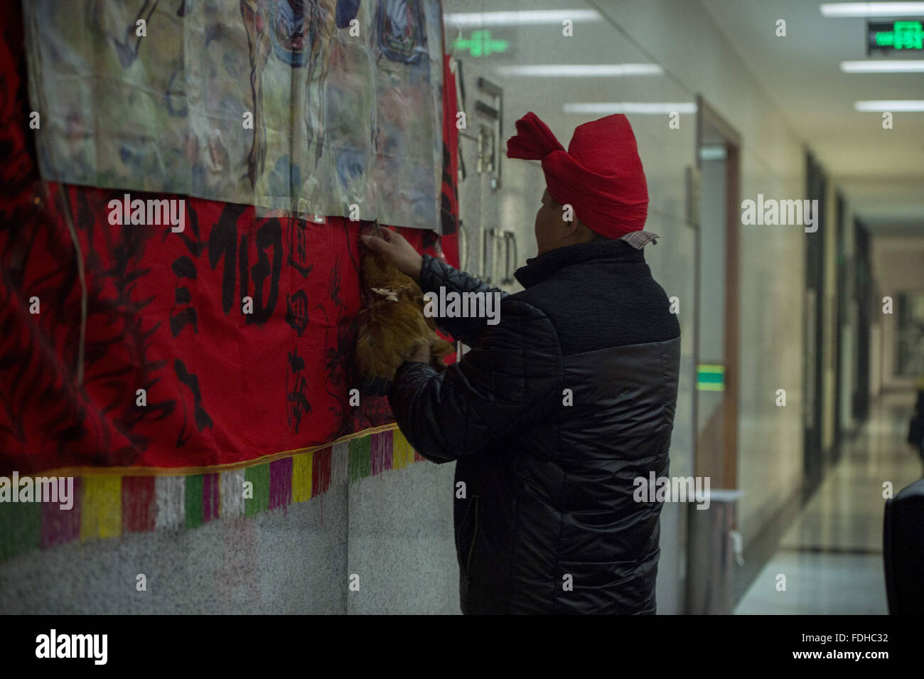 Changsha, Changsha, CHN. 1st Feb, 2016. A wizard presents the ...