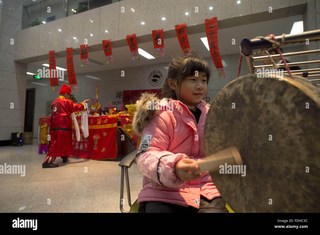 Changsha, Changsha, CHN. 1st Feb, 2016. A wizard presents the ...