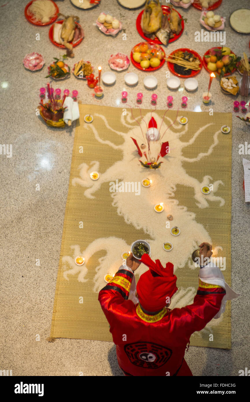 Changsha, Changsha, CHN. 1st Feb, 2016. A wizard presents the ...