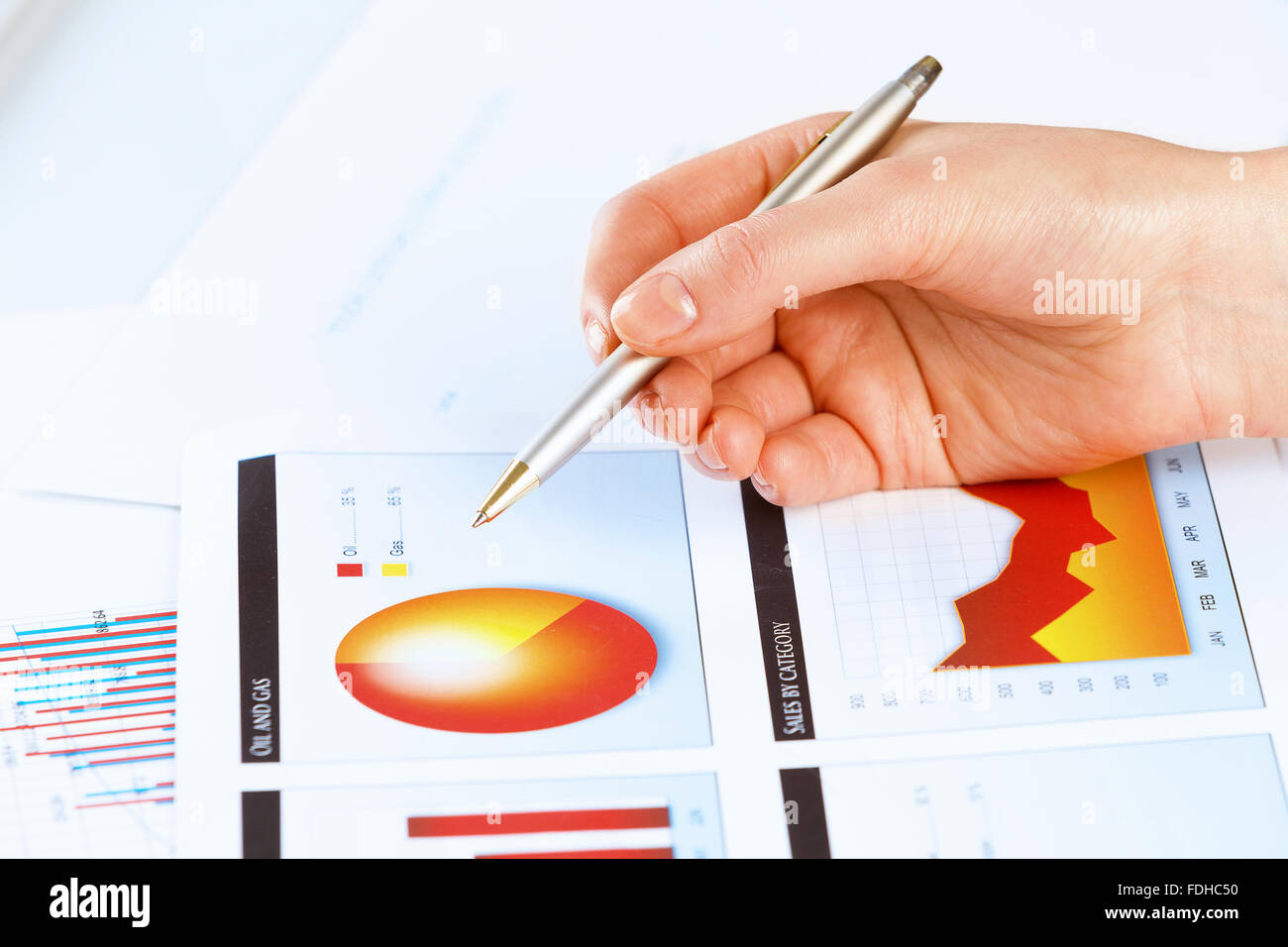Man businessman pointing to bar graphs hi-res stock photography and ...