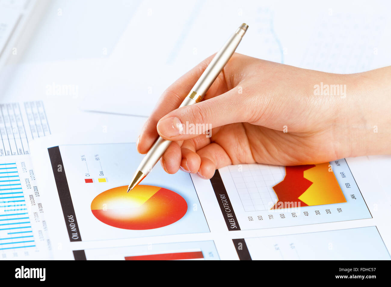 Man businessman pointing to bar graphs hi-res stock photography and ...