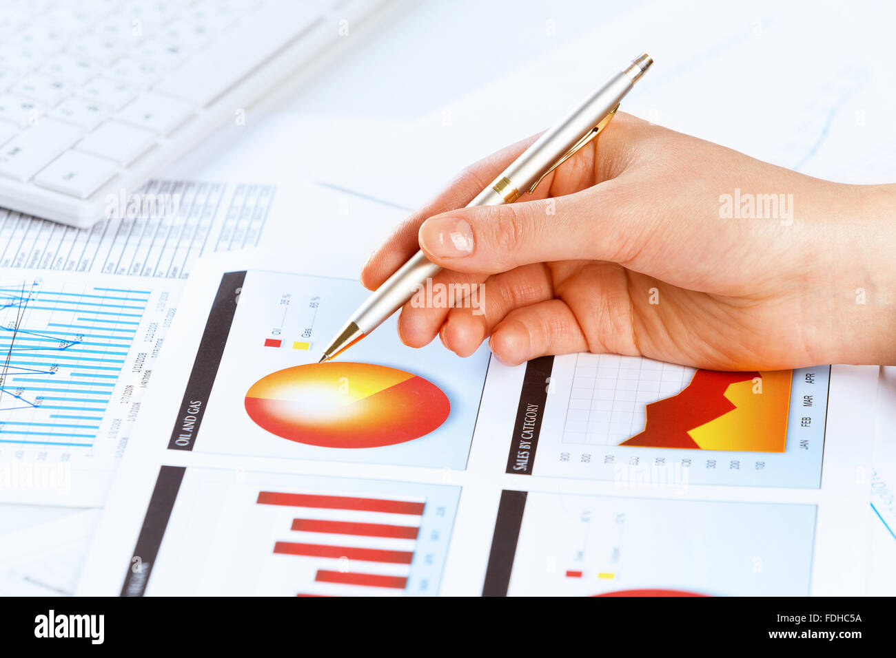 Man businessman pointing to bar graphs hi-res stock photography and ...