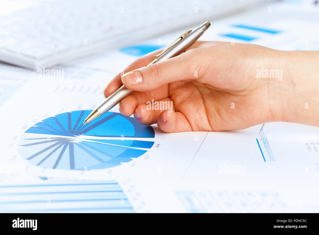 Man businessman pointing to bar graphs hi-res stock photography and ...