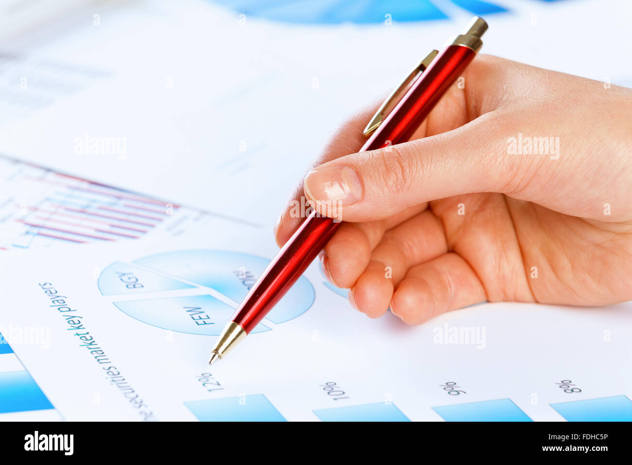 Man businessman pointing to bar graphs hi-res stock photography and ...