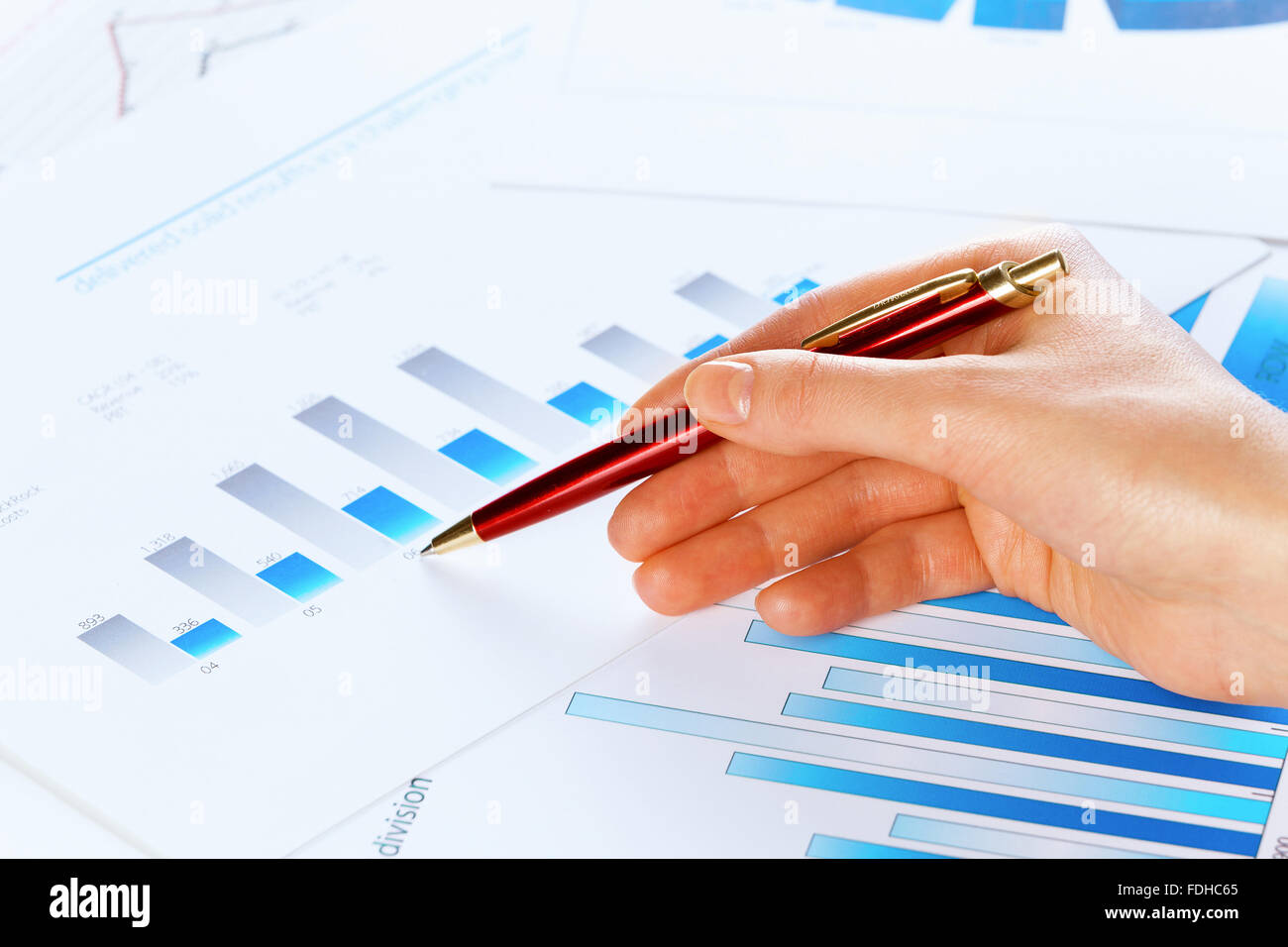 Man businessman pointing to bar graphs hi-res stock photography and ...