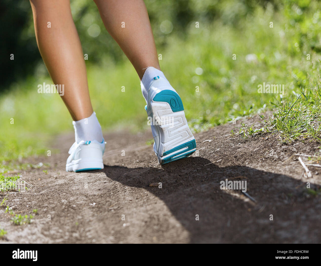 Female feet running hi-res stock photography and images - Alamy
