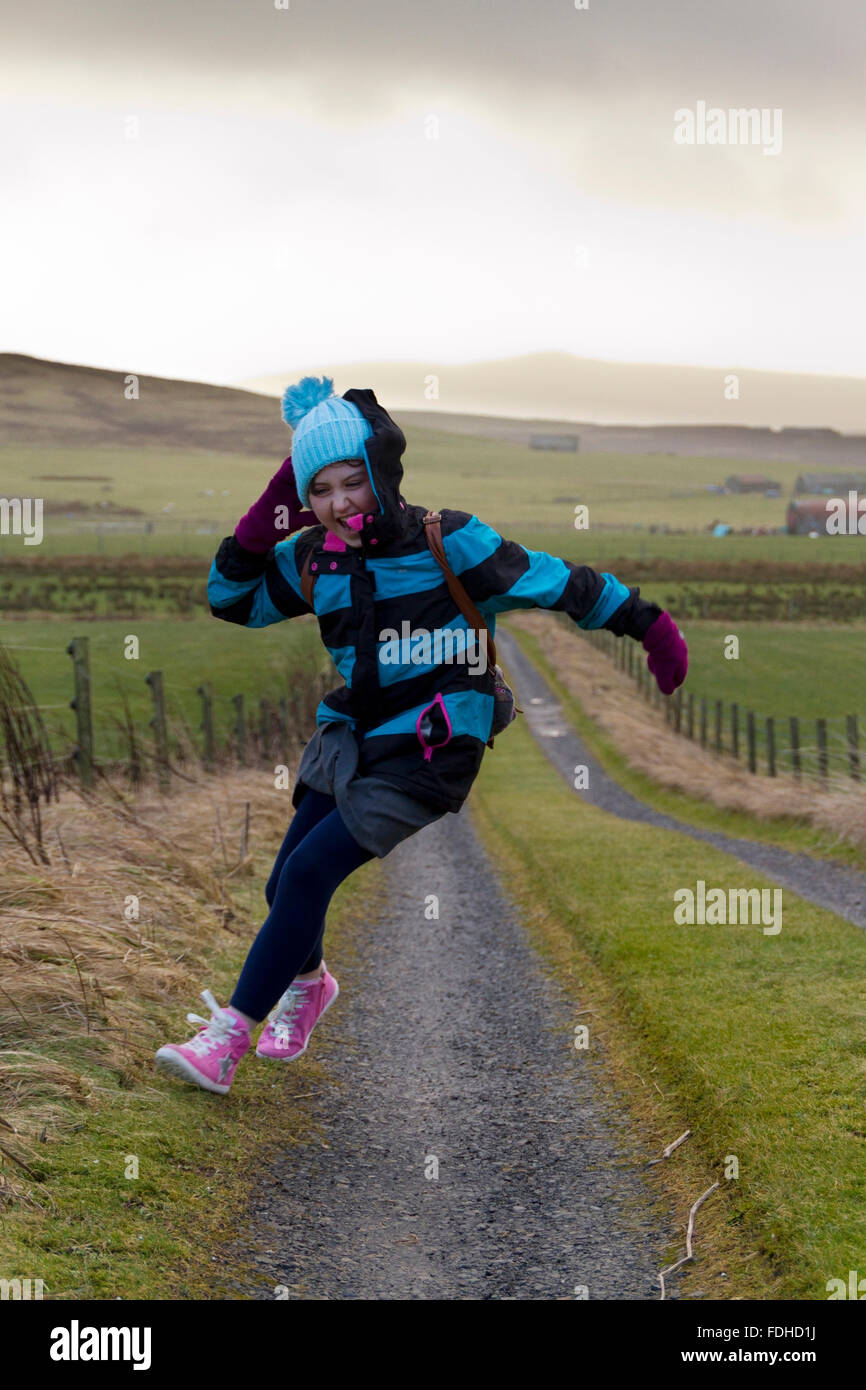 Struggling with wind hi-res stock photography and images - Alamy