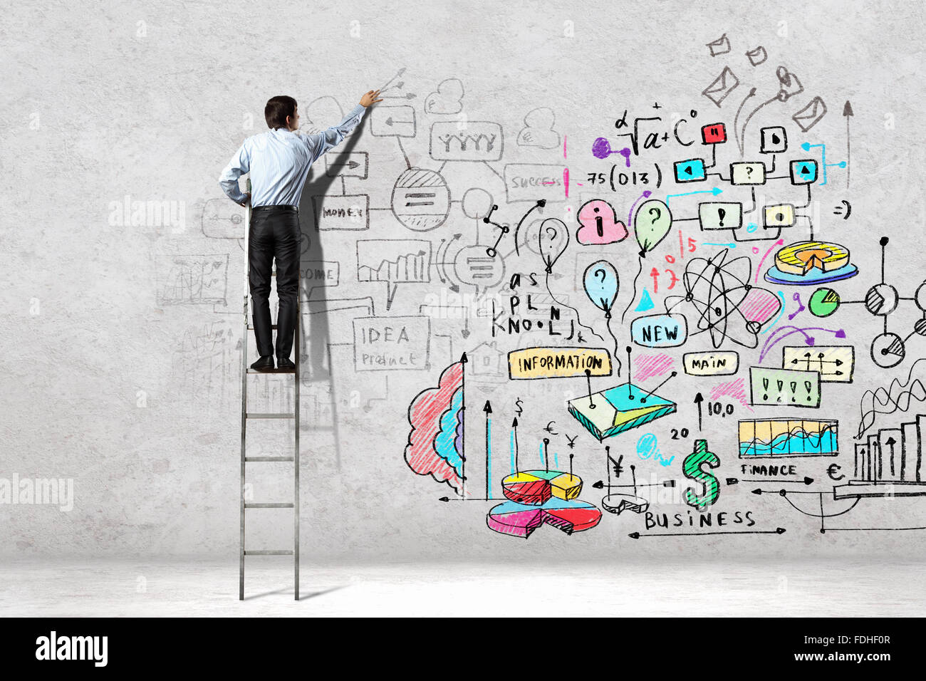 Back view of businessman drawing sketch on wall Stock Photo - Alamy