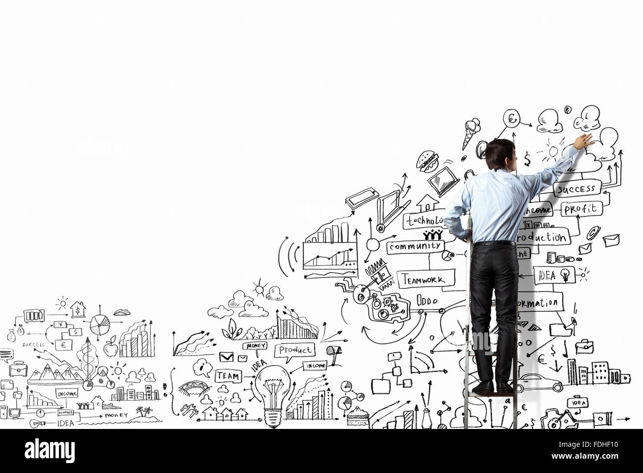 Back view of businessman drawing sketch on wall Stock Photo - Alamy