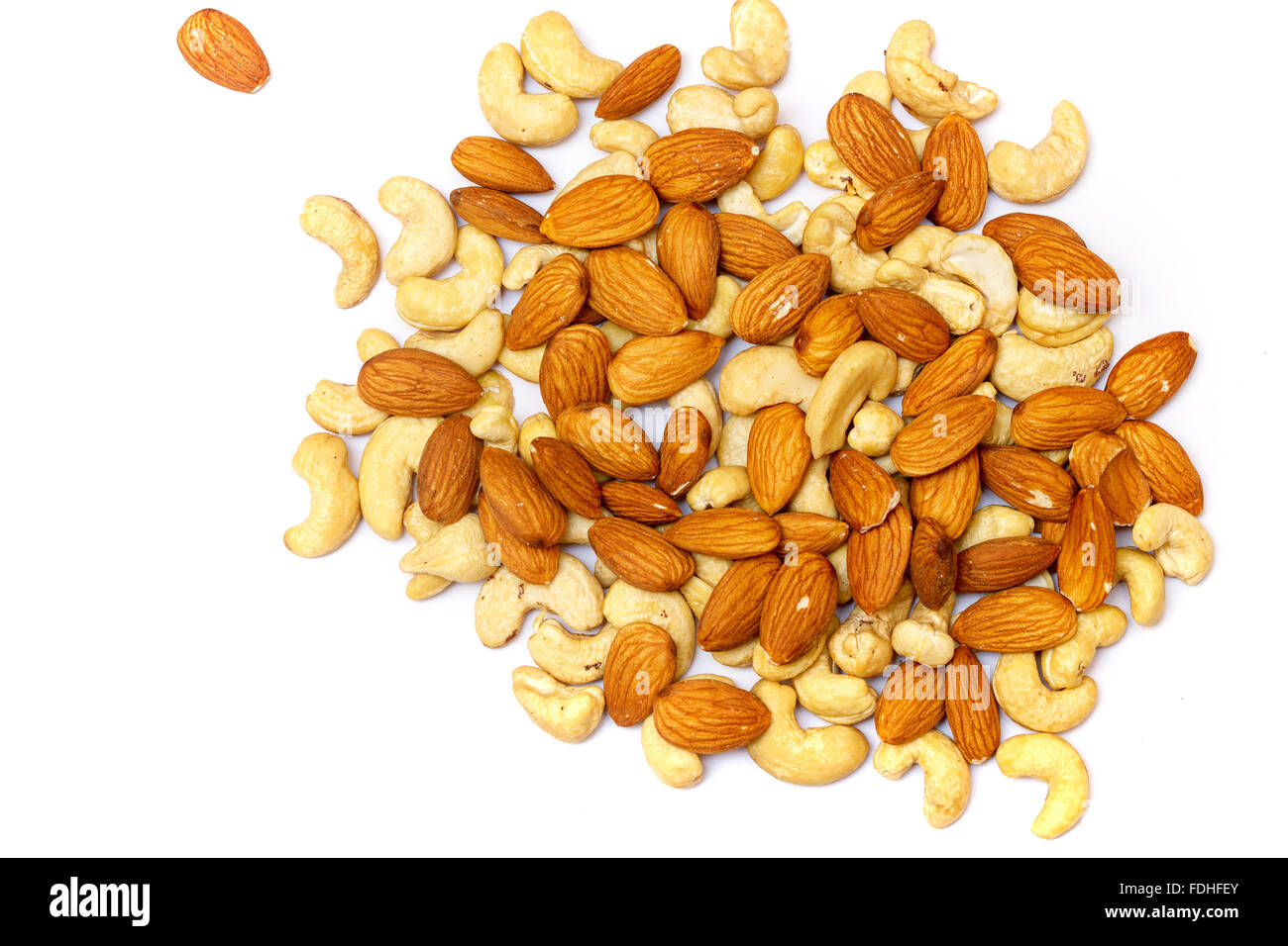 Nuts mix close-up. Cashews and almonds. Vegetarian snack Stock Photo ...