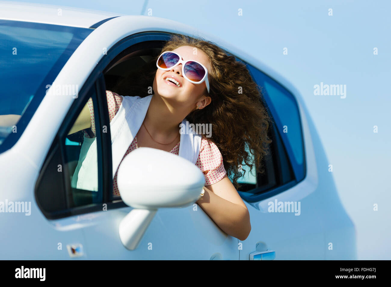Teen waving out of car hi-res stock photography and images - Alamy
