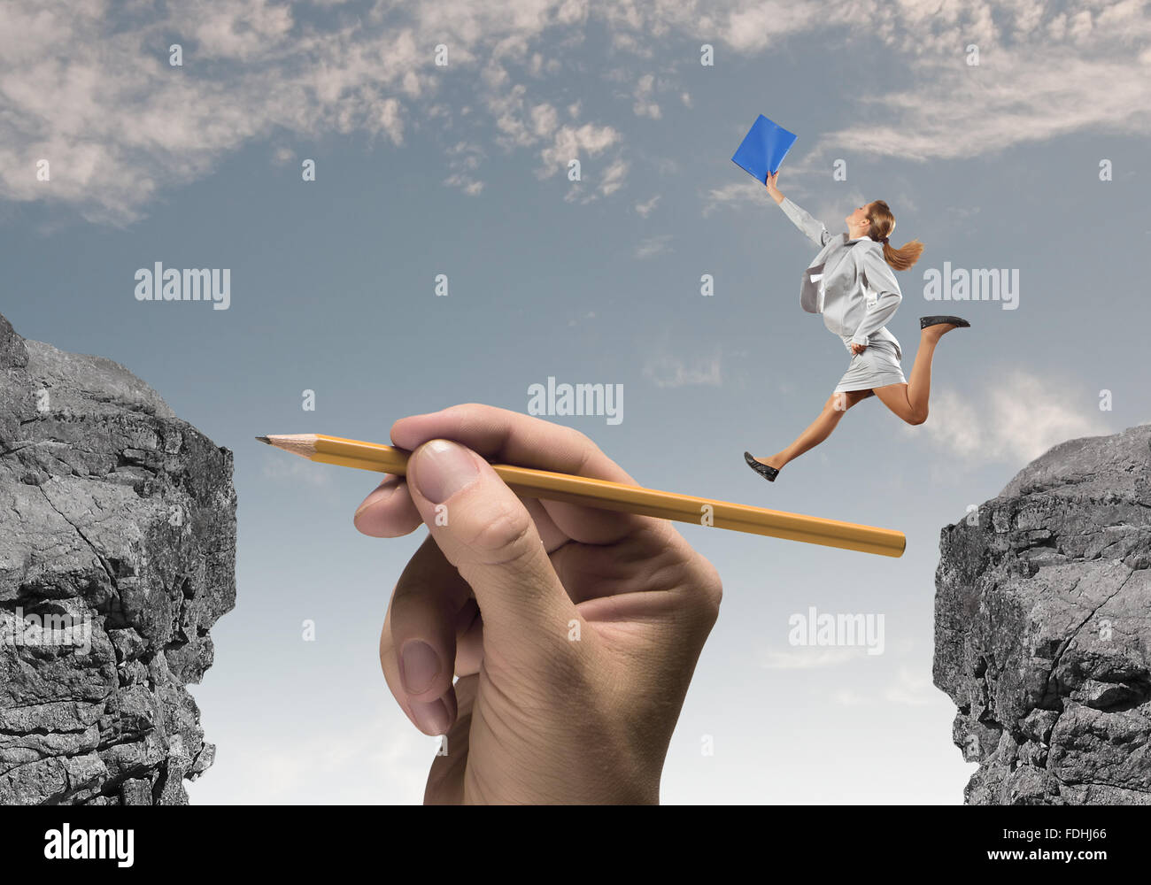 Businesswoman jumping over gap. Risk and challenge concept Stock Photo ...