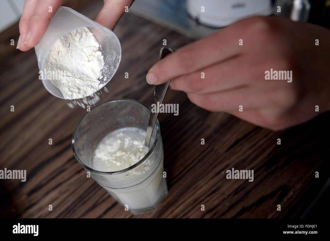 ILLUSTRATION - Drink powder with vitamins and minerals in a measuring ...