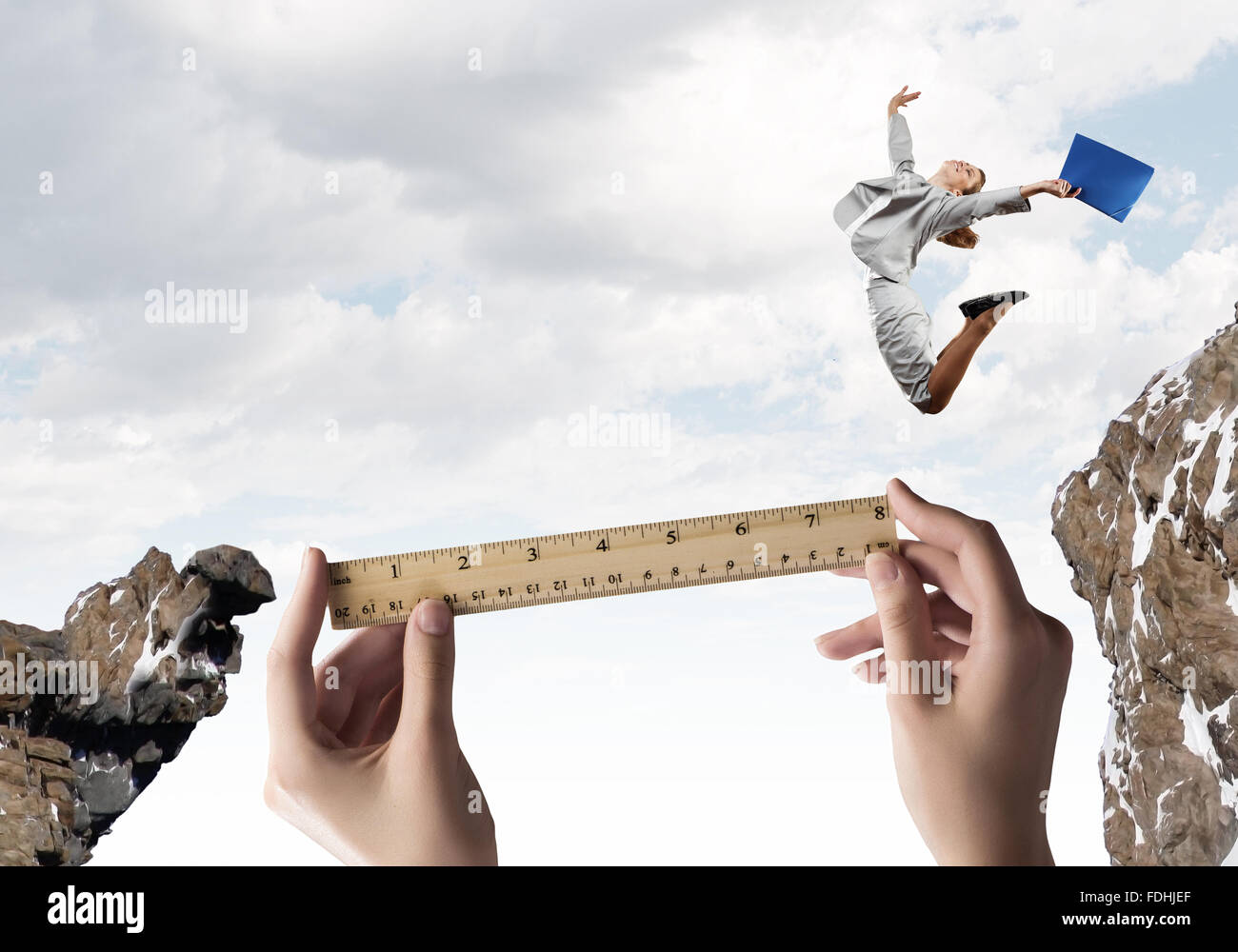Businesswoman jumping over gap. Risk and challenge concept Stock Photo ...