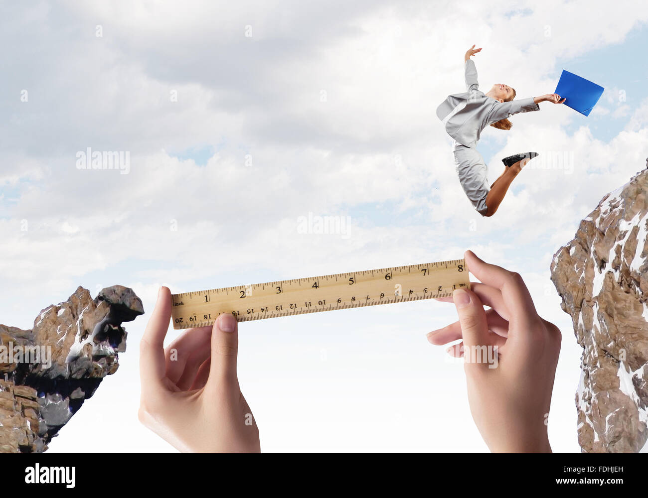 Businesswoman jumping over gap. Risk and challenge concept Stock Photo ...