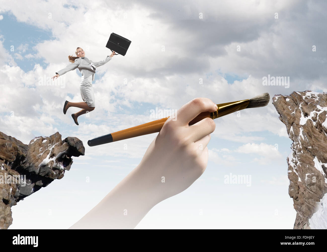 Businesswoman jumping over gap. Risk and challenge concept Stock Photo ...