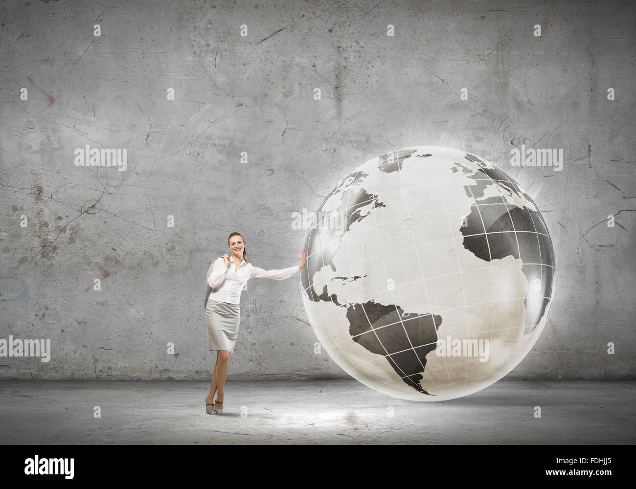 Young successful businesswoman leaning on Earth planet Stock Photo - Alamy