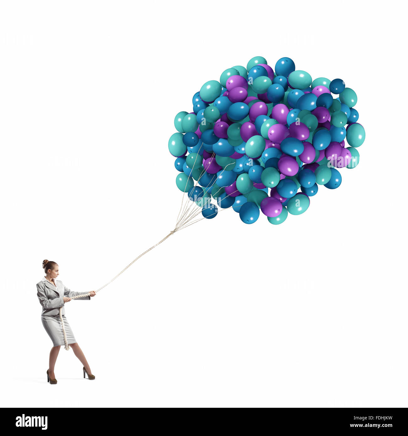 Young businesswoman pulling bunch of colorful balloons Stock Photo - Alamy