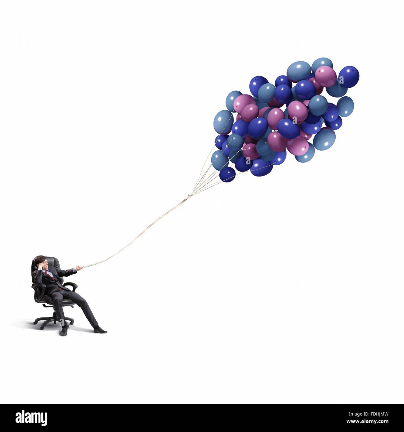 Young successful businessman holding bunch of colorful balloons Stock ...
