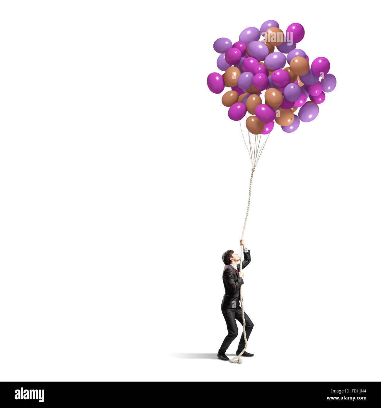 Young successful businessman holding bunch of colorful balloons Stock ...