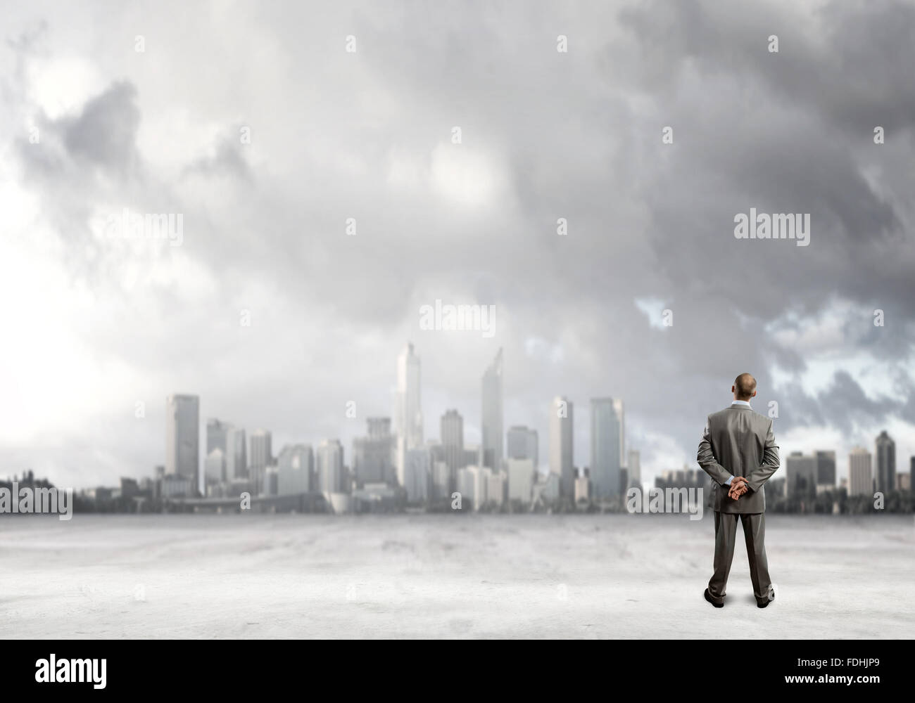 Back view of confident businessman looking at city Stock Photo - Alamy