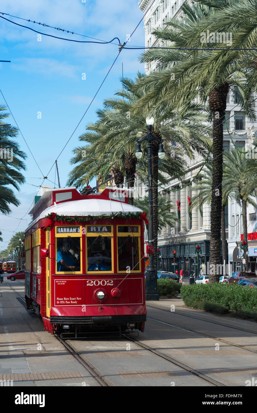 Red trolley car on Canal Street in downtown New Orleans, Louisiana ...