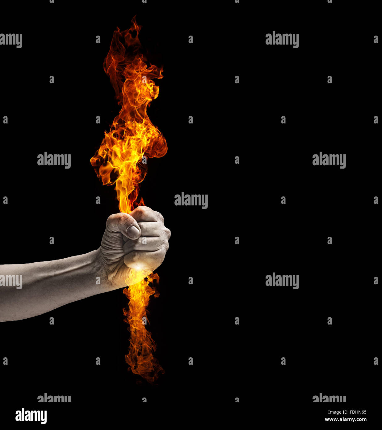 Close up of human hand holding fire flame Stock Photo - Alamy