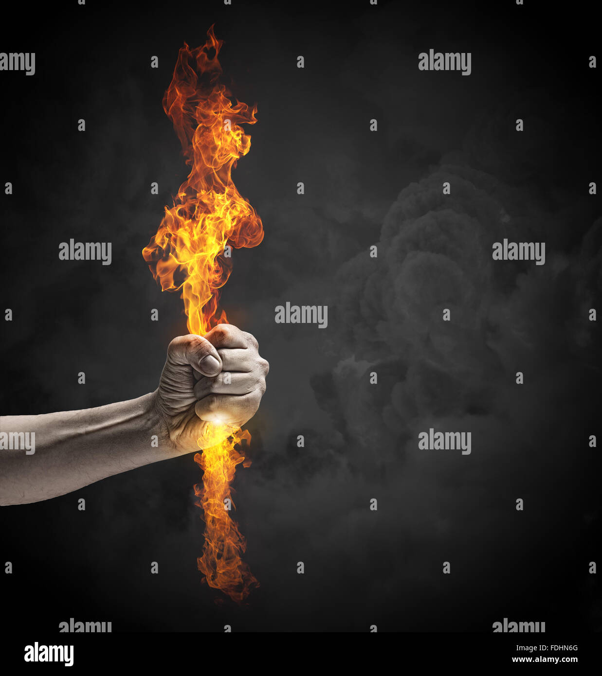 Close up of human hand holding fire flame Stock Photo - Alamy