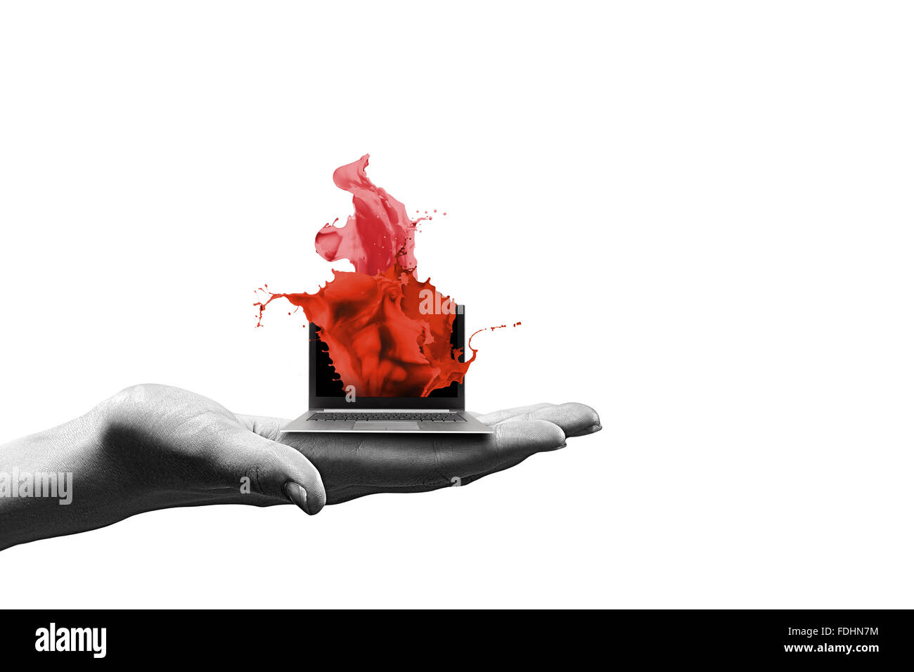 Close up of human hand holding laptop Stock Photo - Alamy