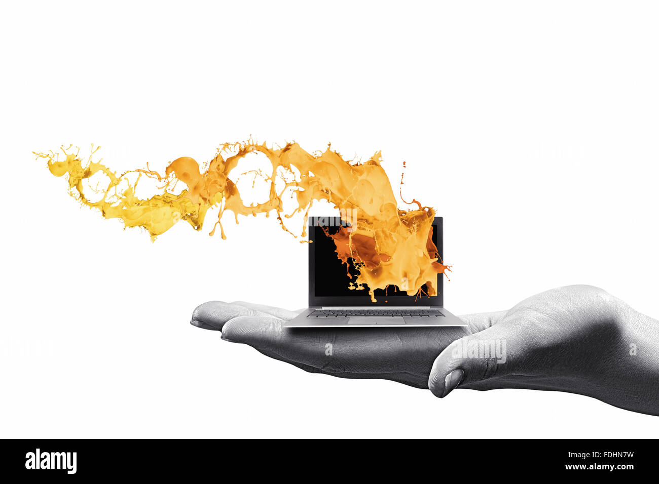 Close up of human hand holding laptop Stock Photo - Alamy