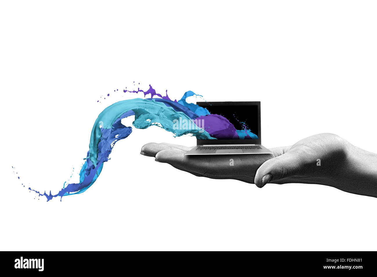 Close up of human hand holding laptop Stock Photo - Alamy