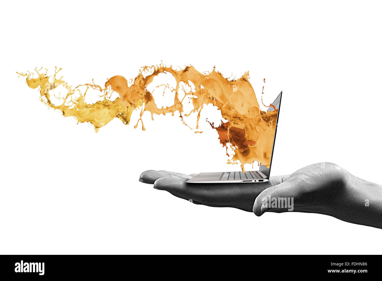 Close up of human hand holding laptop Stock Photo - Alamy