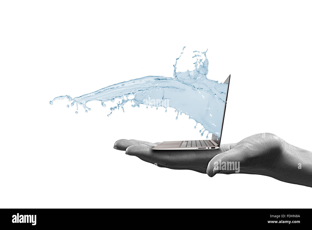 Close up of human hand holding laptop Stock Photo - Alamy