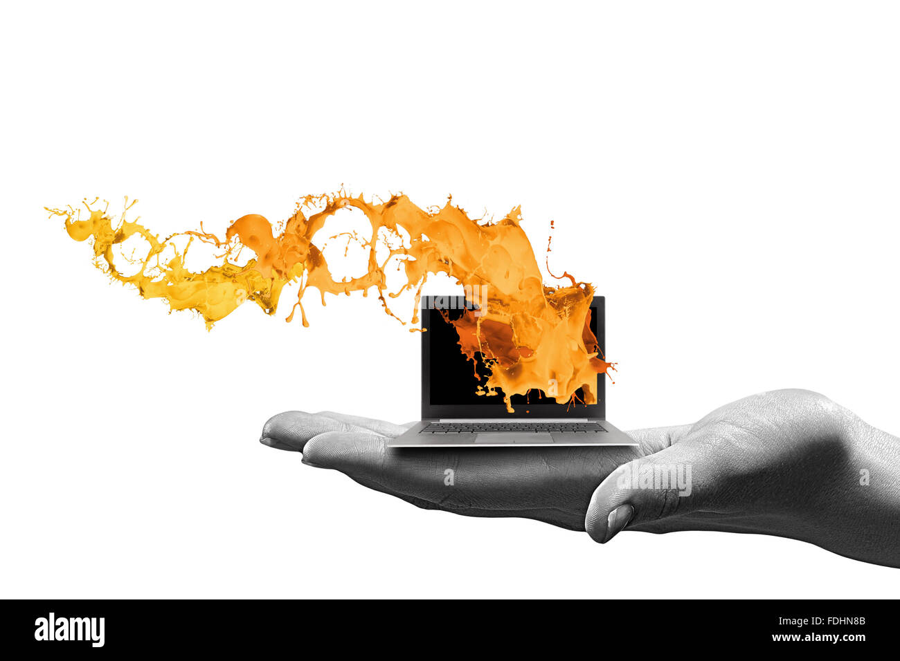 Close up of human hand holding laptop Stock Photo - Alamy