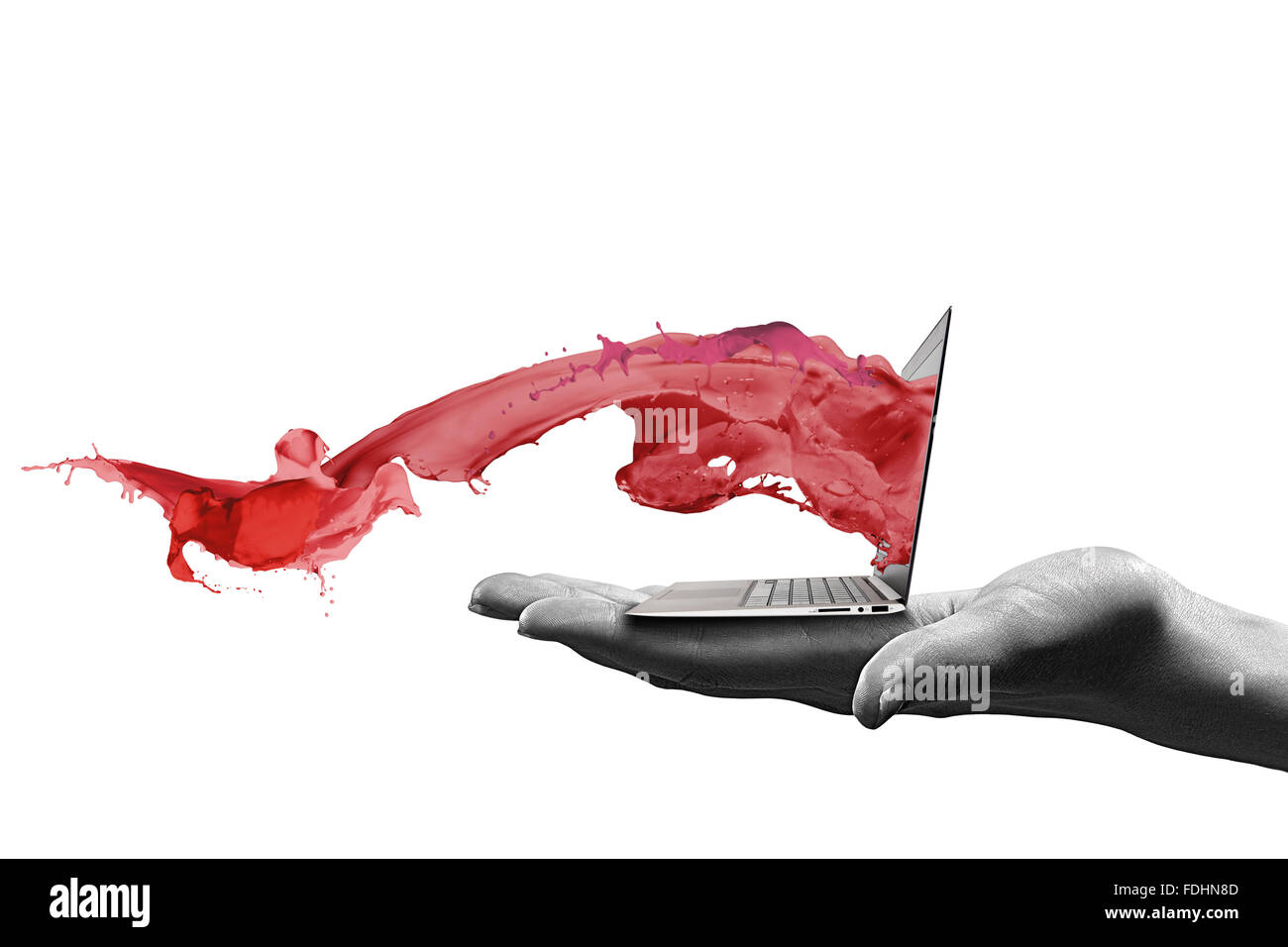 Close up of human hand holding laptop Stock Photo - Alamy