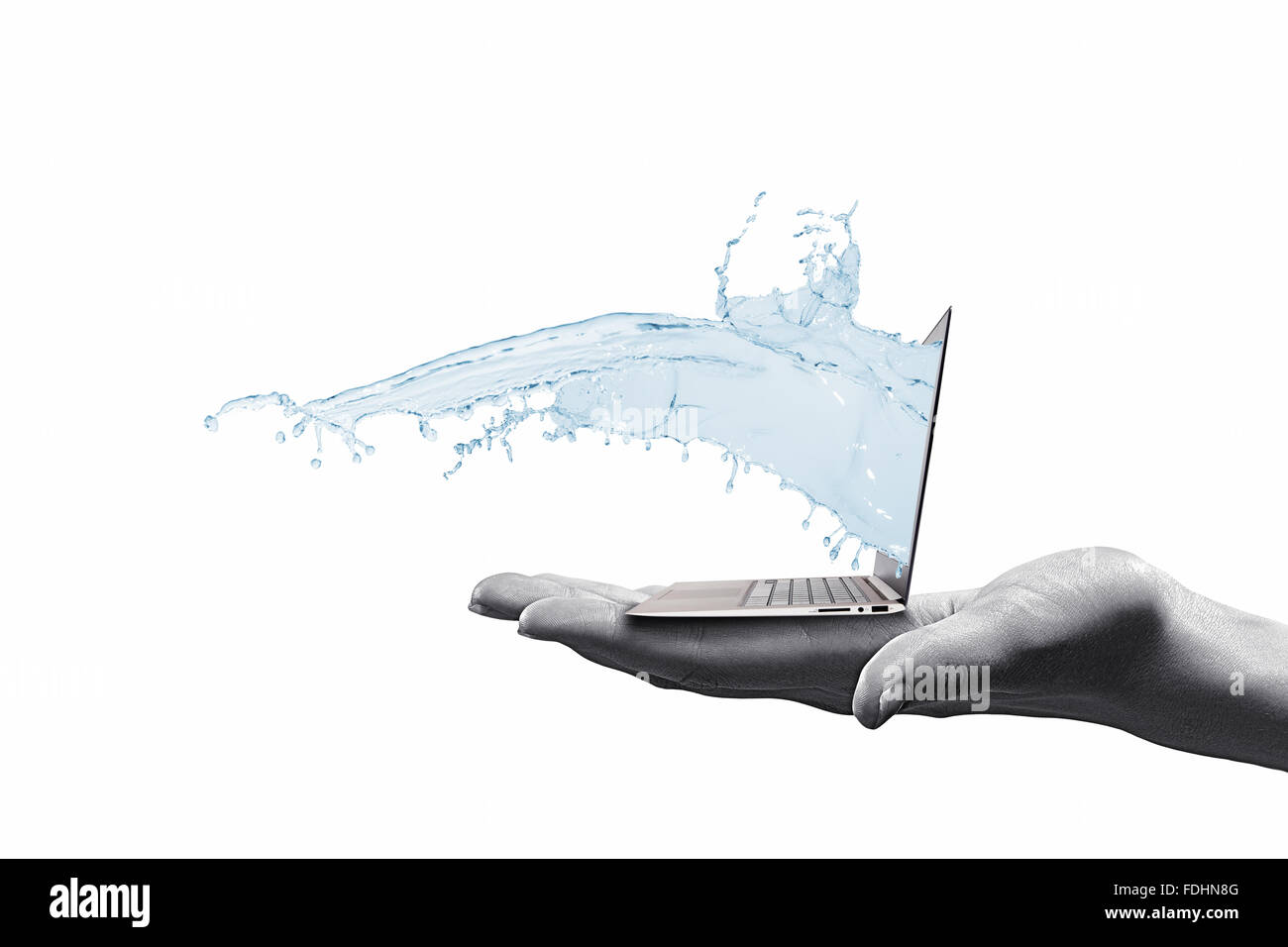 Close up of human hand holding laptop Stock Photo - Alamy
