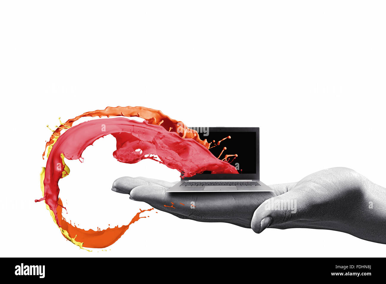 Close up of human hand holding laptop Stock Photo - Alamy